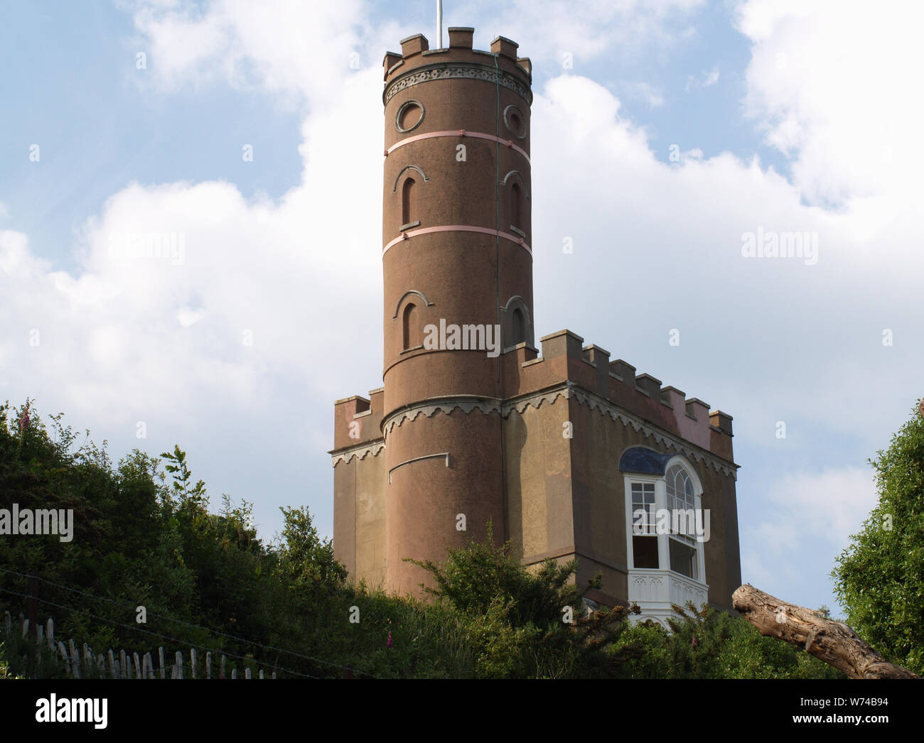 Luttrell's Tower, a 3 story stuccoed yellow brick folly at Calshot ...