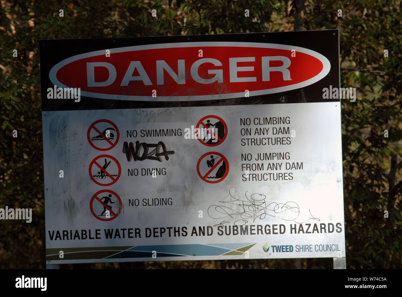 Danger Variable Water Depths and Submerged Hazards sign, Clarrie Hall ...
