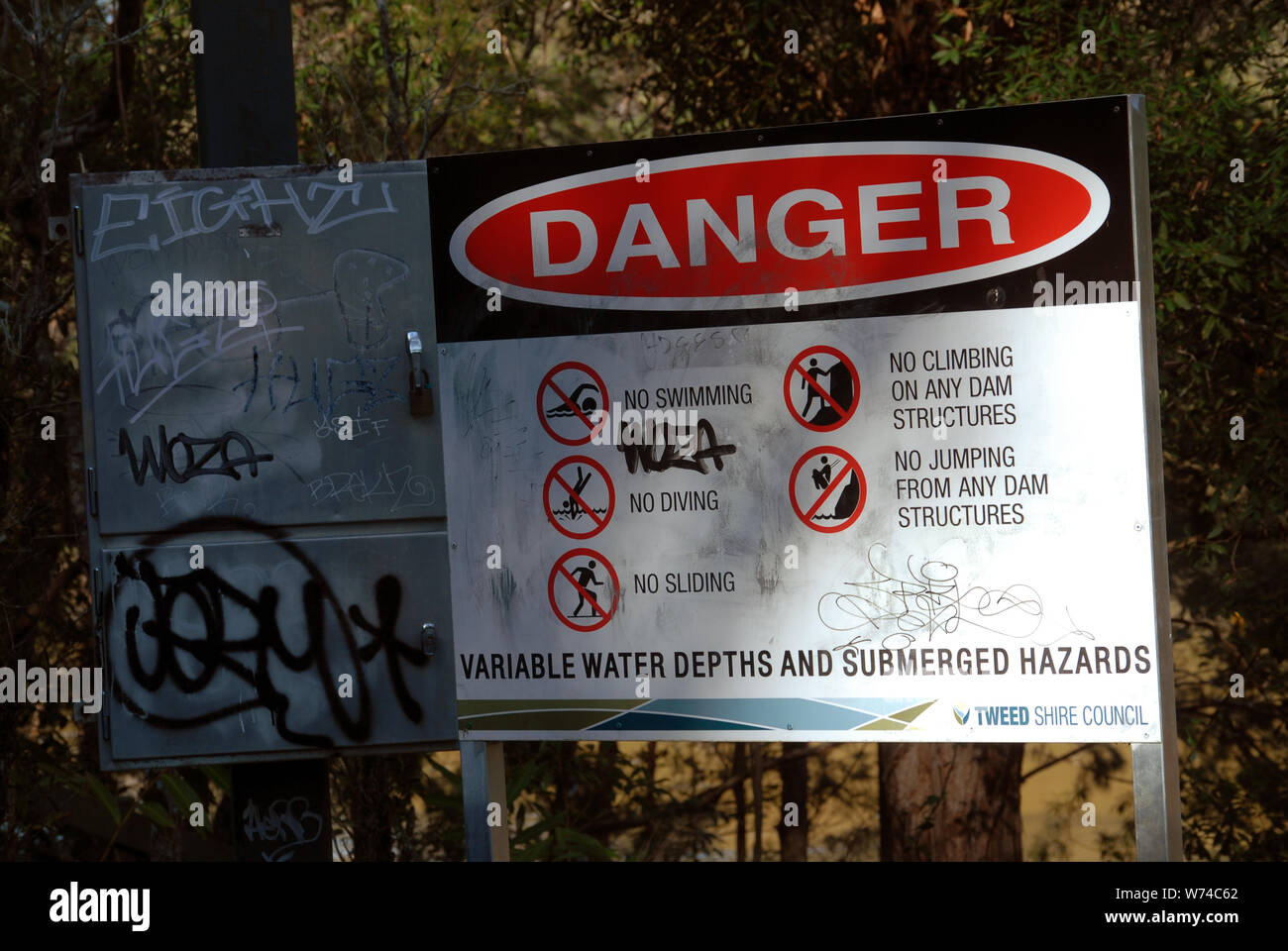 Danger Variable Water Depths and Submerged Hazards sign, Clarrie Hall ...