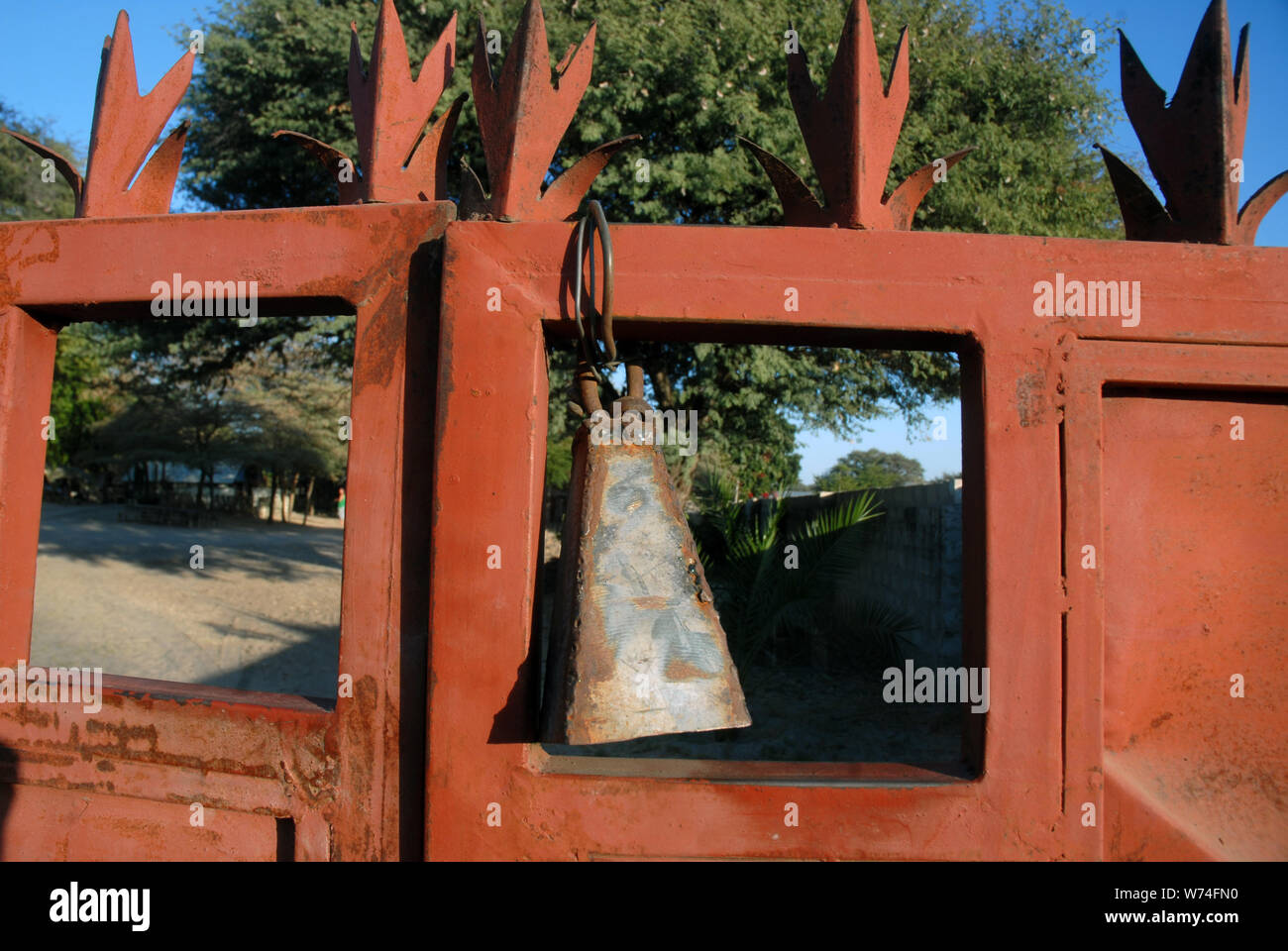Bell hanging on front gate, Mwandi, Zambia, Africa Stock Photo - Alamy