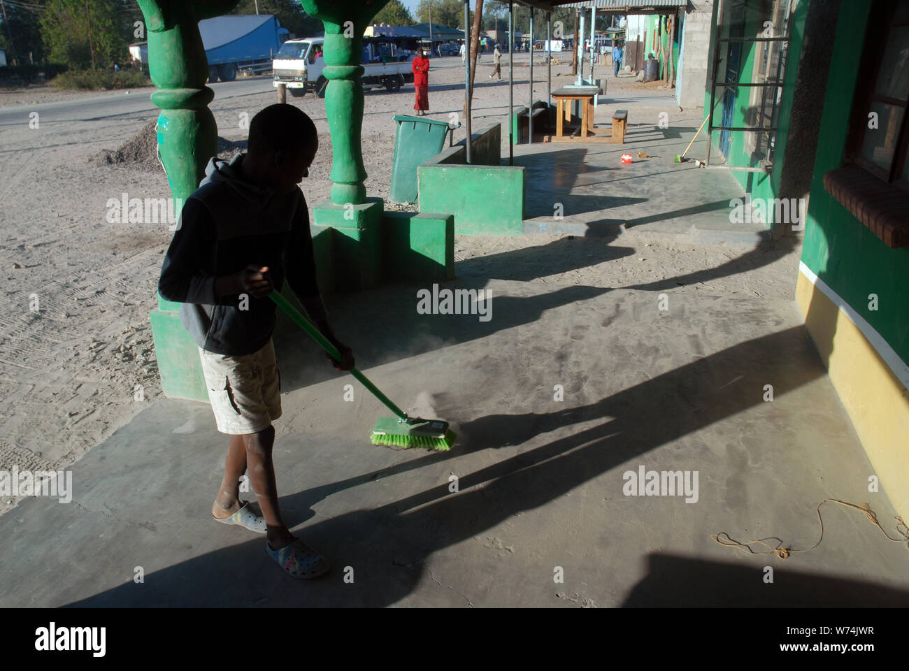 Sweeping floor africa hi-res stock photography and images - Alamy