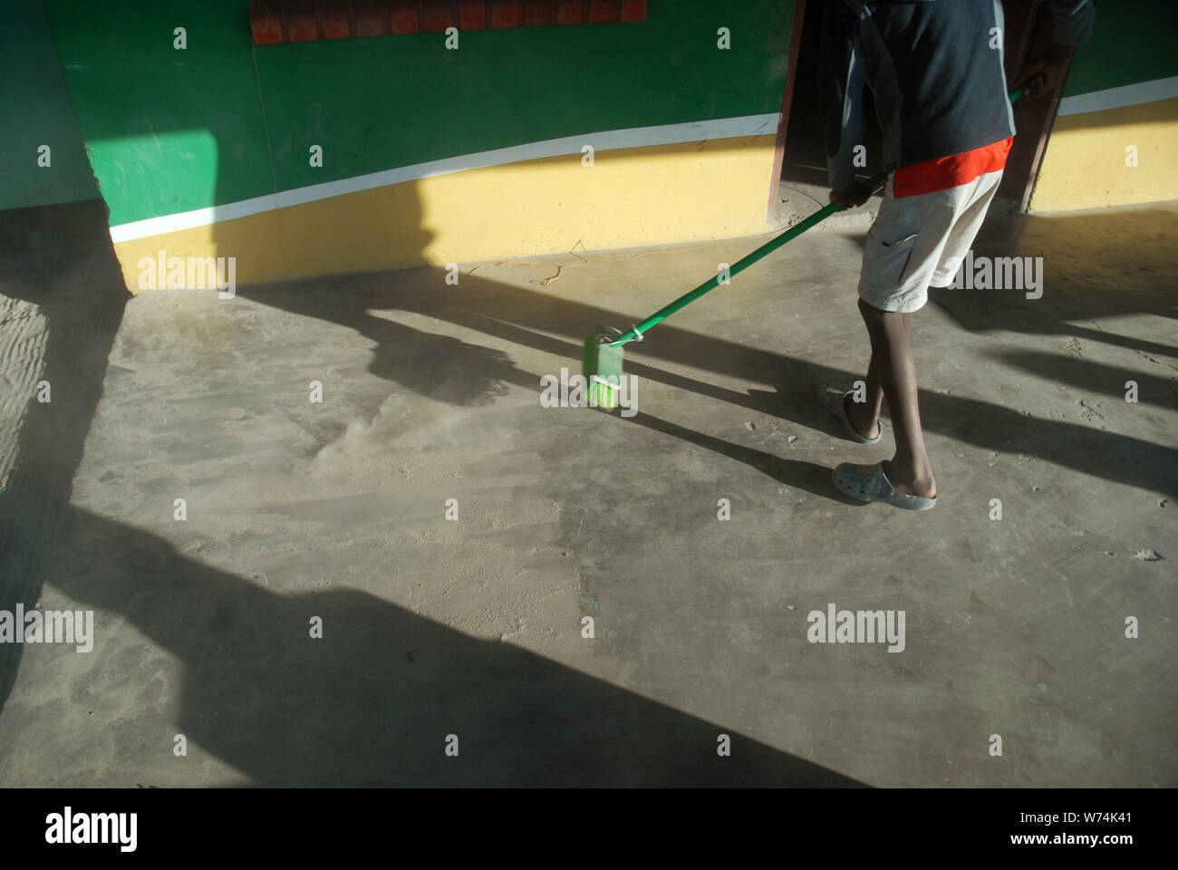 Sweeping floor africa hi-res stock photography and images - Alamy