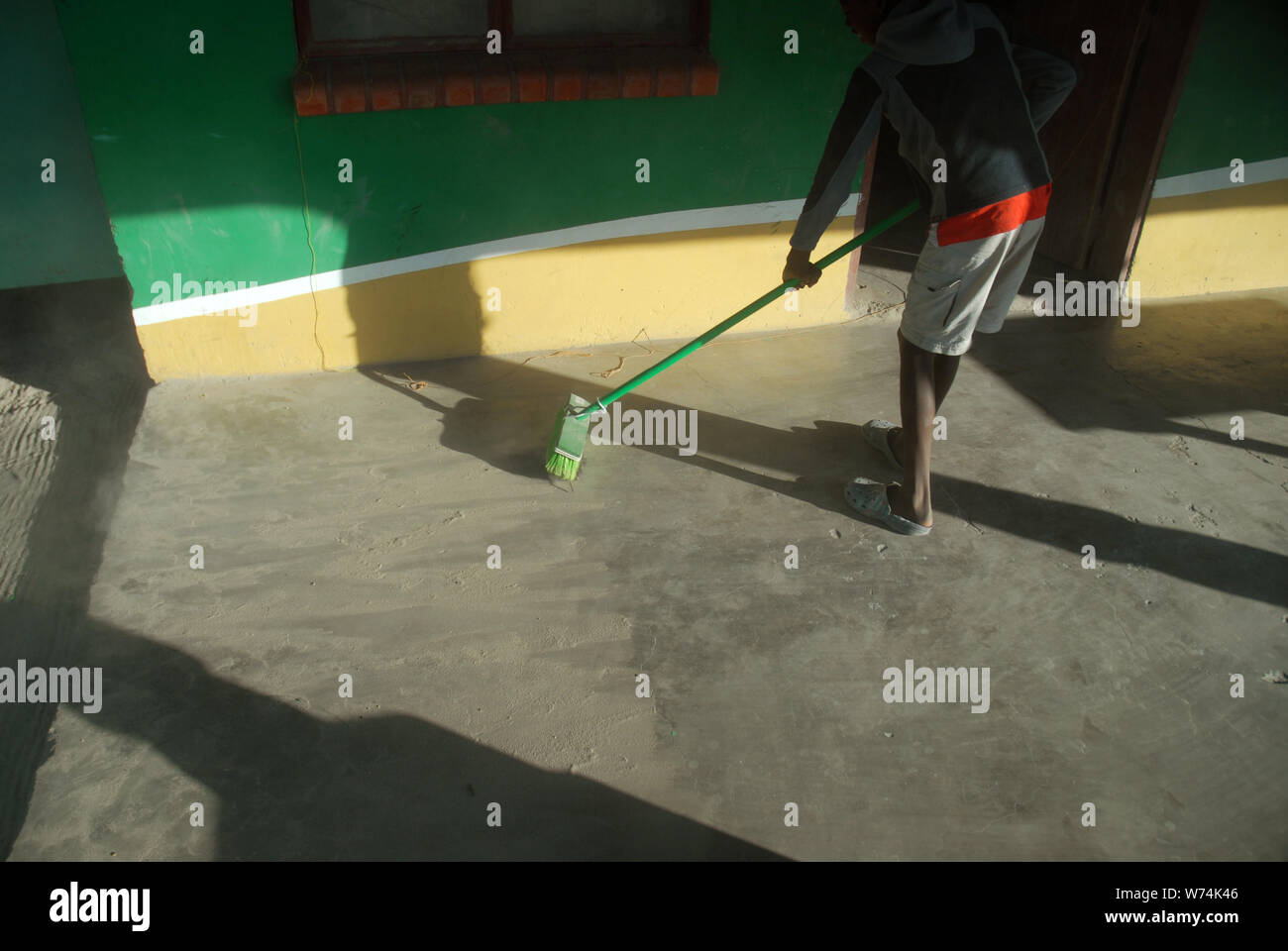 Sweeping floor africa hi-res stock photography and images - Alamy