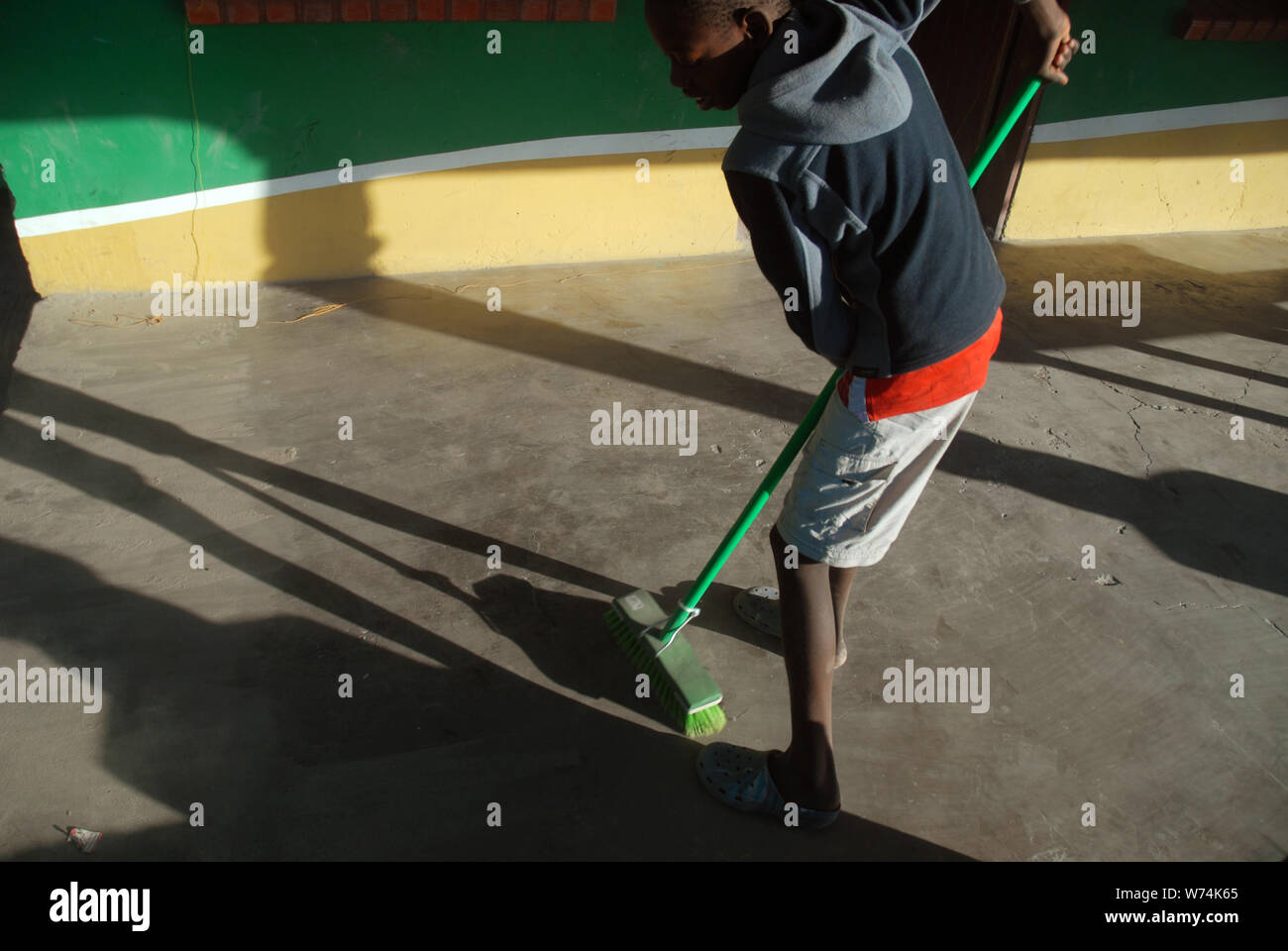 Sweeping floor africa hi-res stock photography and images - Alamy