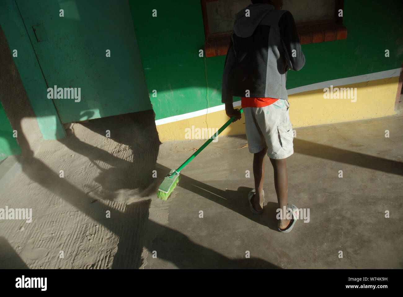 Sweeping floor africa hi-res stock photography and images - Alamy