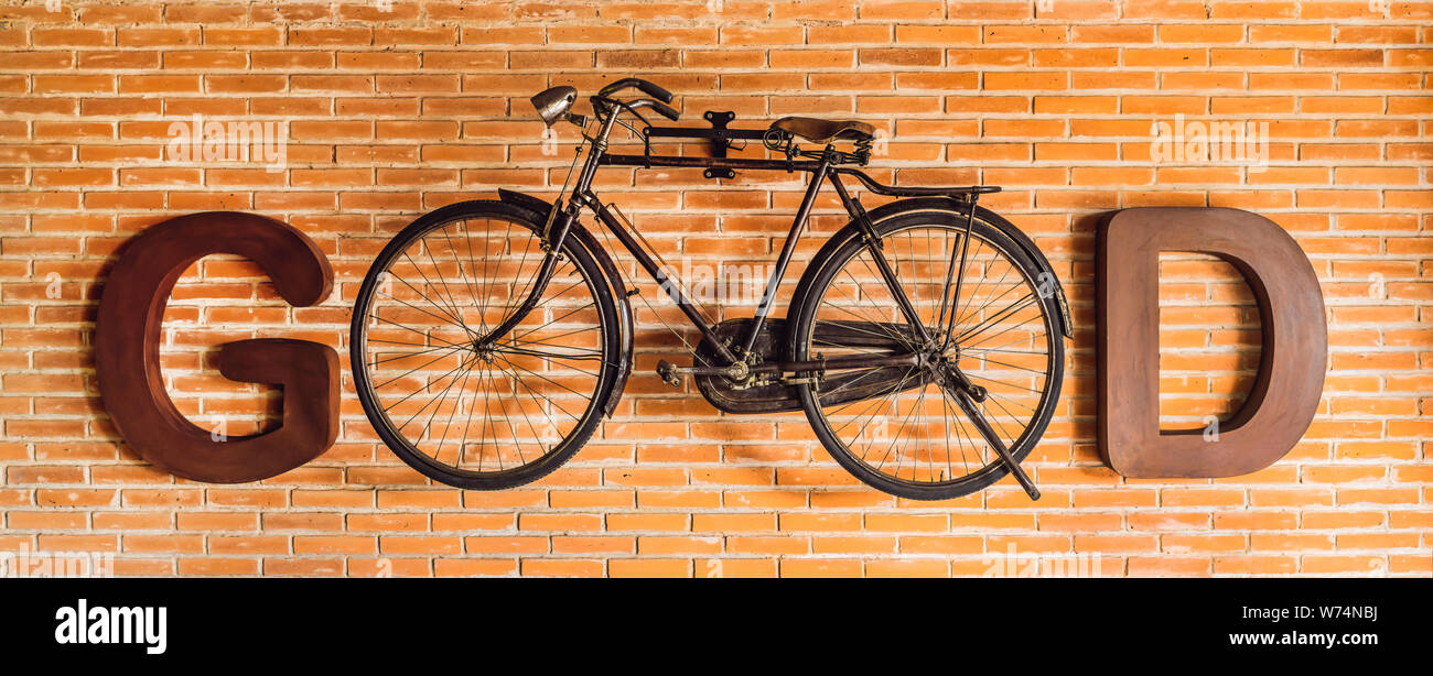 Inscription GOOD written with letters and a bicycle on the background ...