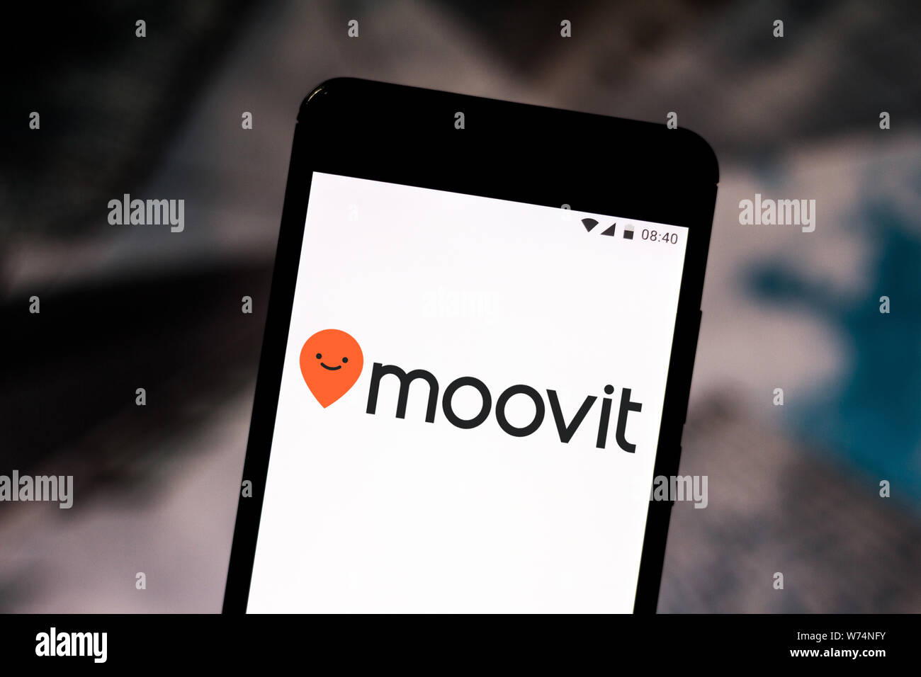 In this photo illustration the Moovit logo is seen displayed on a ...
