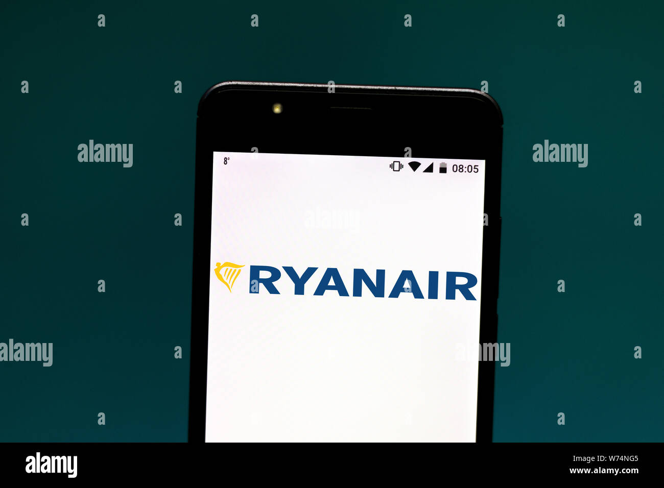 In this photo illustration the Ryanair logo is seen displayed on a ...