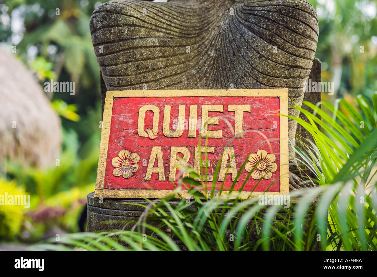 A sign QUIET AREA in a quiet corner of the garden Stock Photo - Alamy