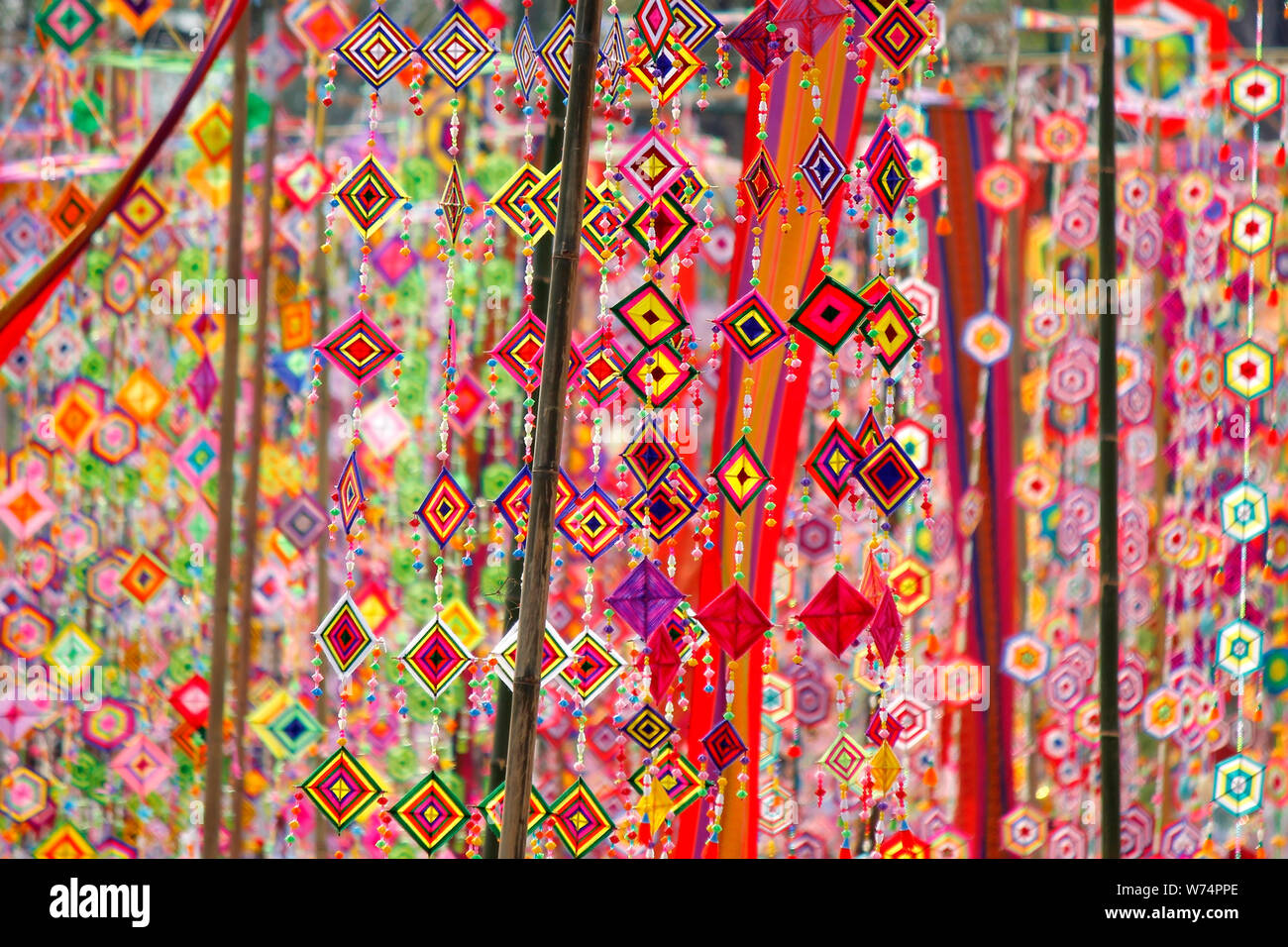 photo of colorful tung flag as background Stock Photo - Alamy