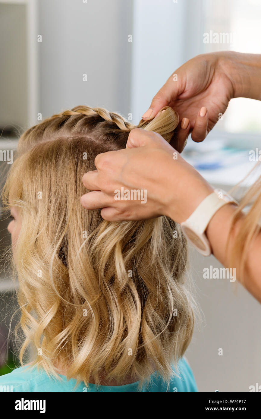 Barber braids high braid. Hairdressing services. Creating evening ...