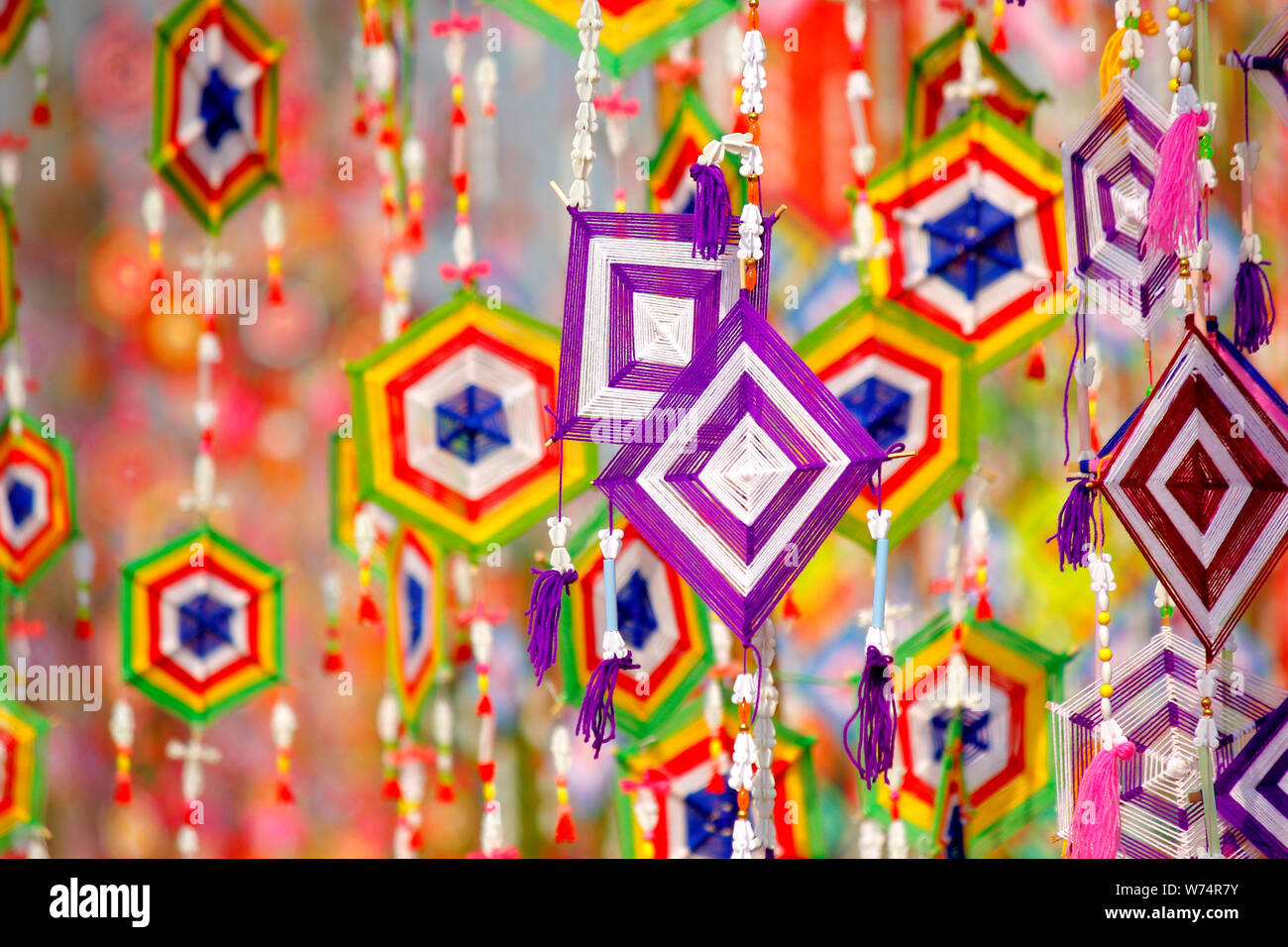 photo of colorful tung flag as background Stock Photo - Alamy