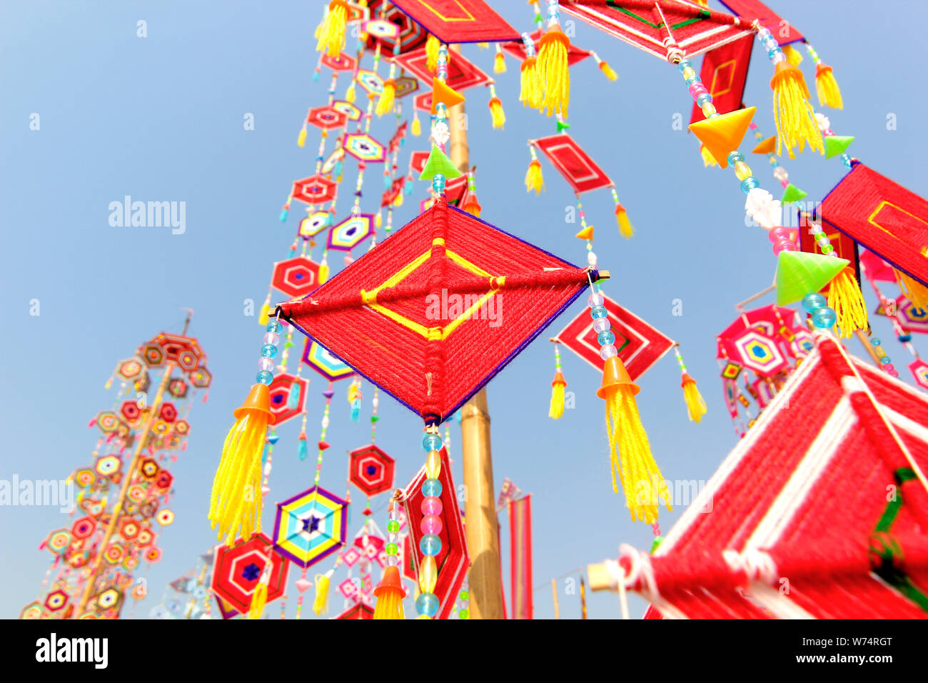 photo of colorful tung flag as background Stock Photo - Alamy
