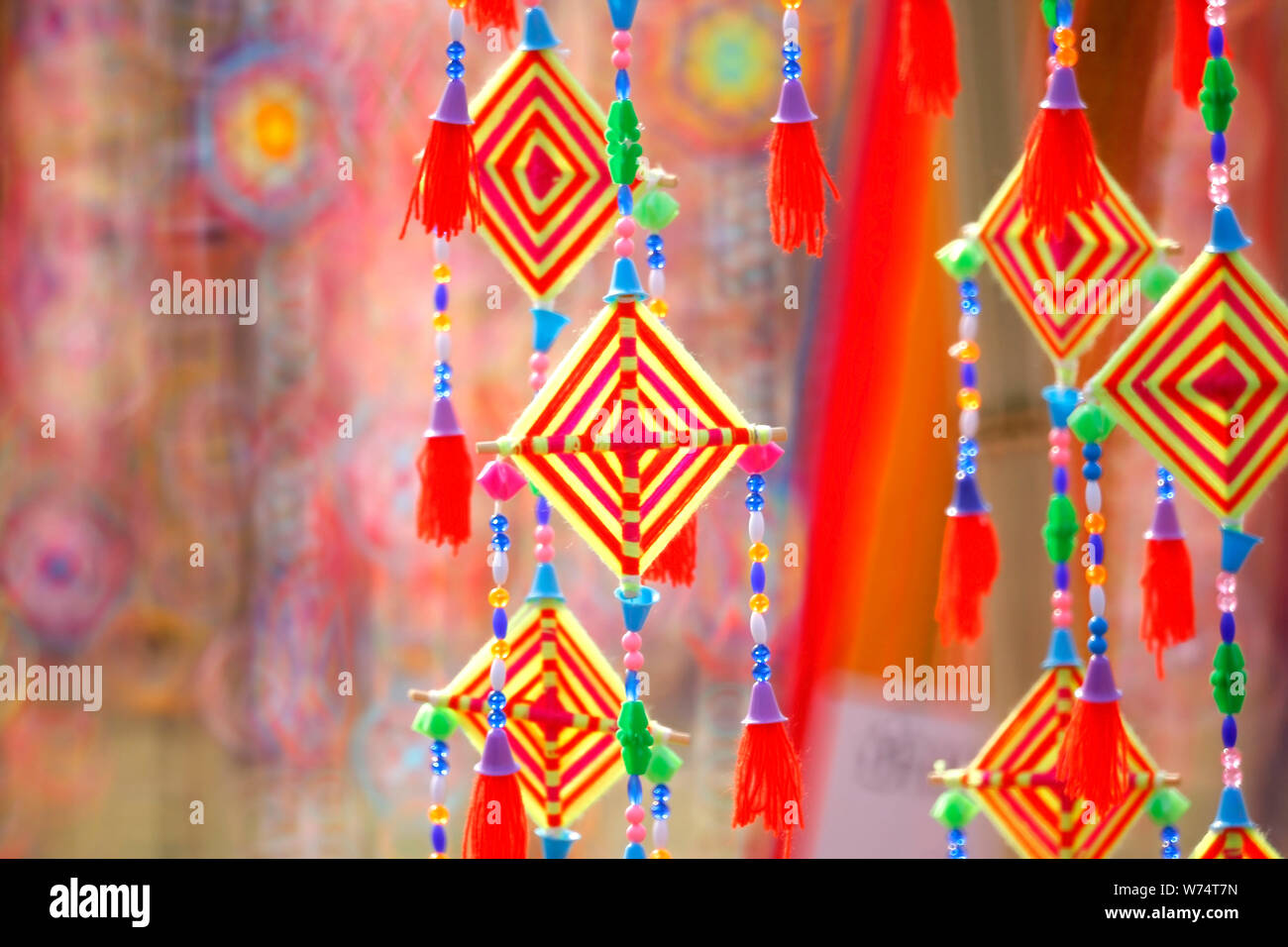 photo of colorful tung flag as background Stock Photo - Alamy