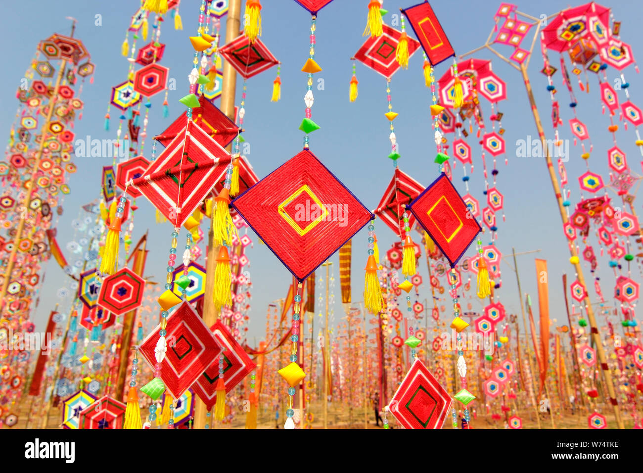 photo of colorful tung flag as background Stock Photo - Alamy