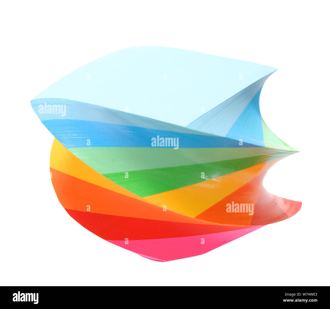 a pile of colorful note paper isolated on white Stock Photo - Alamy