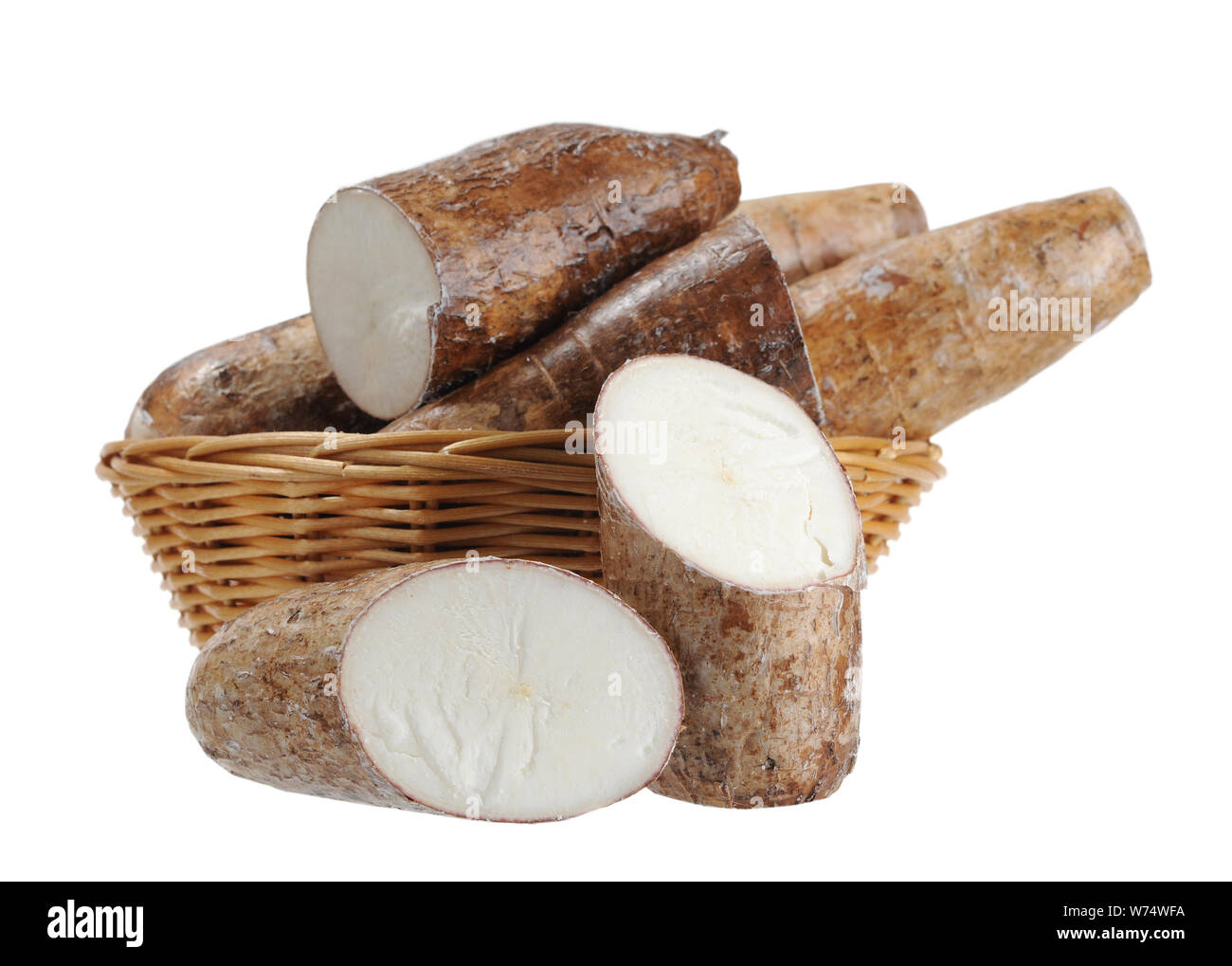 chopped and whole cassava in bamboo basket isolate on white Stock Photo ...