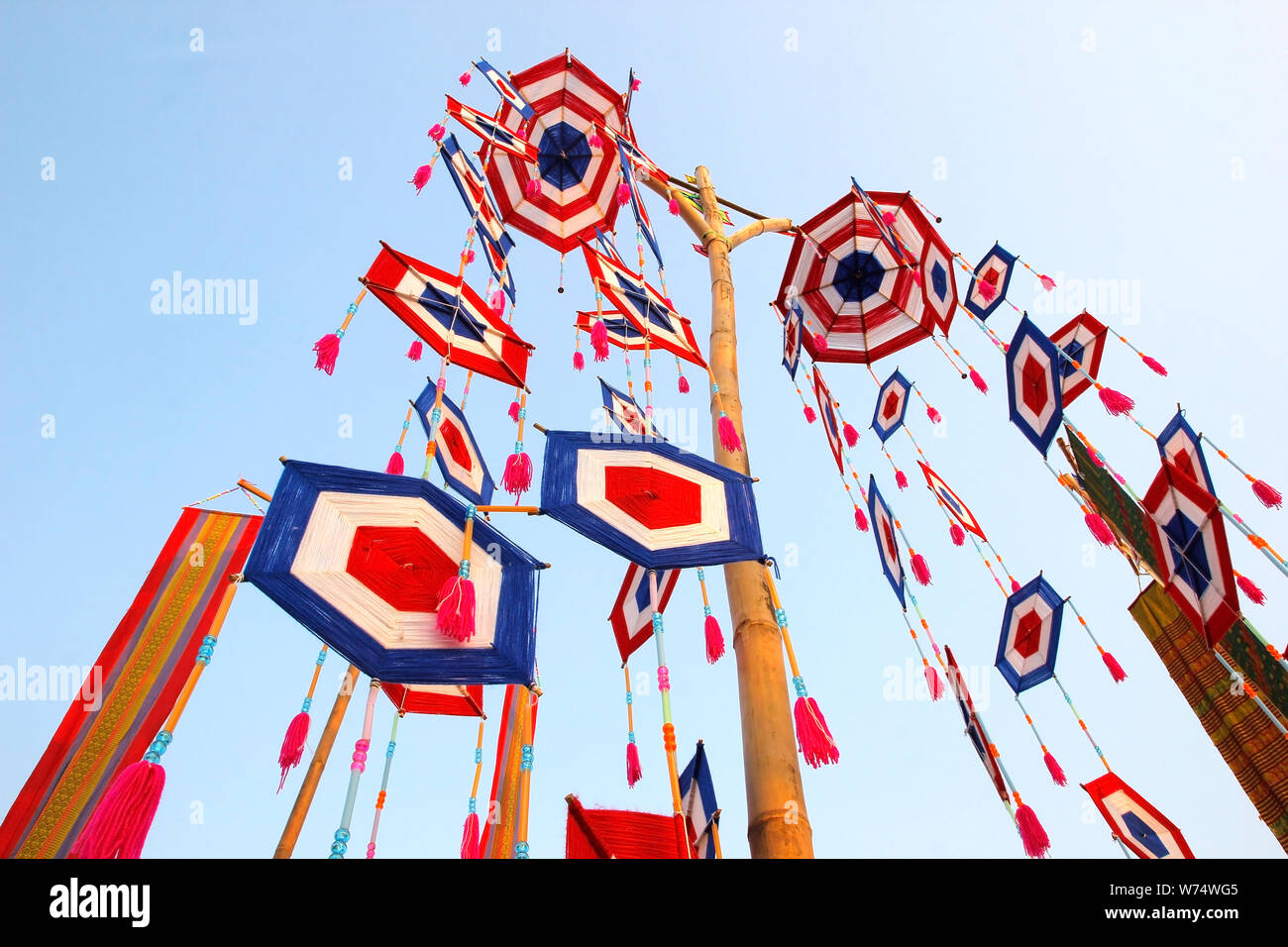 photo of colorful tung flag as background Stock Photo - Alamy