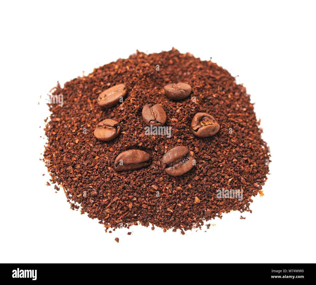 crushed coffee beans on white background Stock Photo - Alamy
