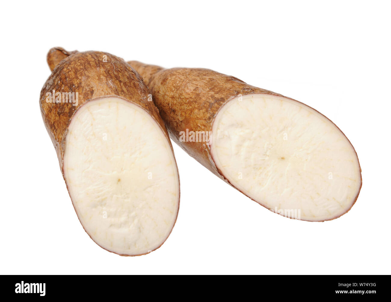 chopped cassava isolated on white background Stock Photo - Alamy