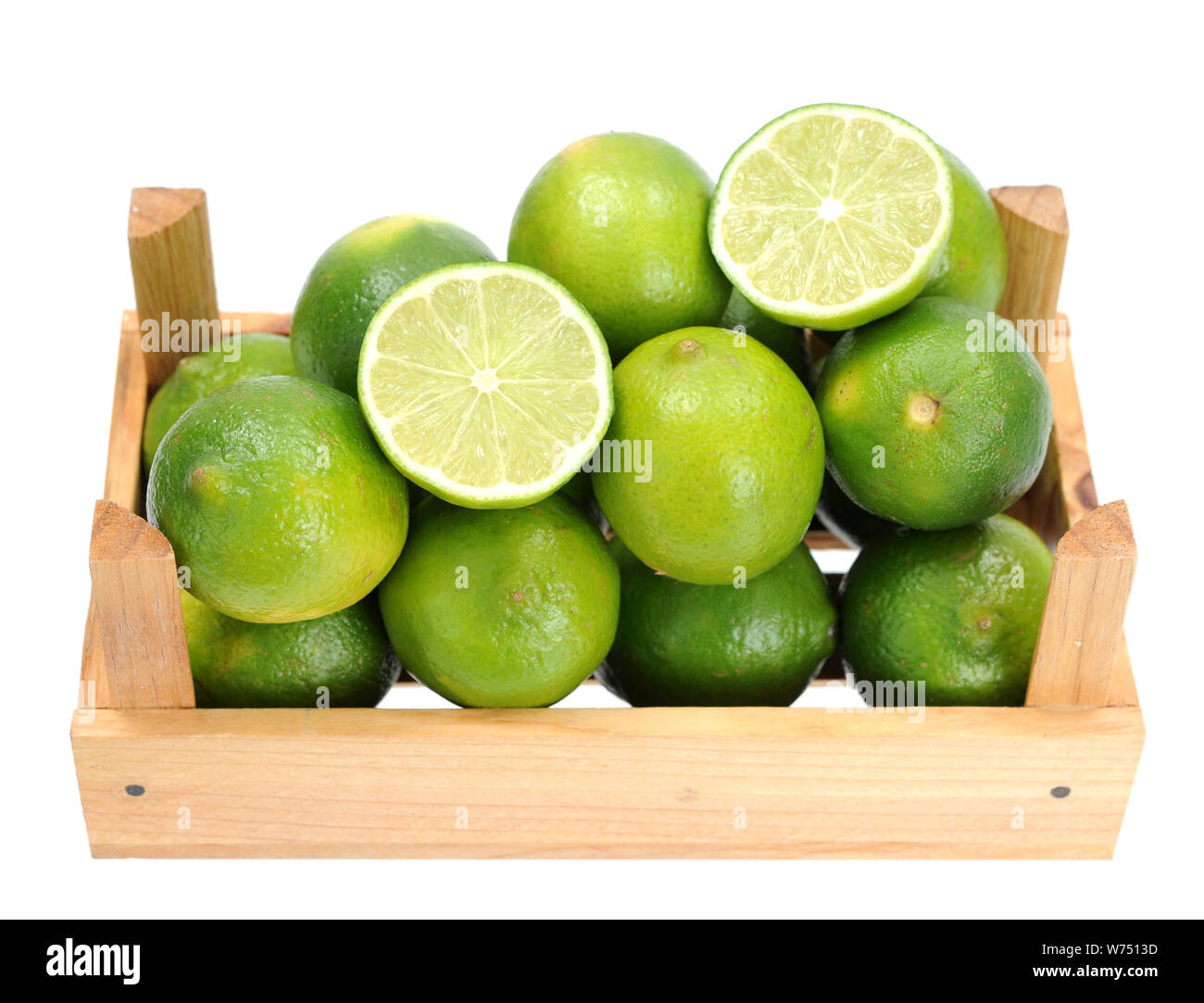 lime in crate isolated on white background Stock Photo - Alamy