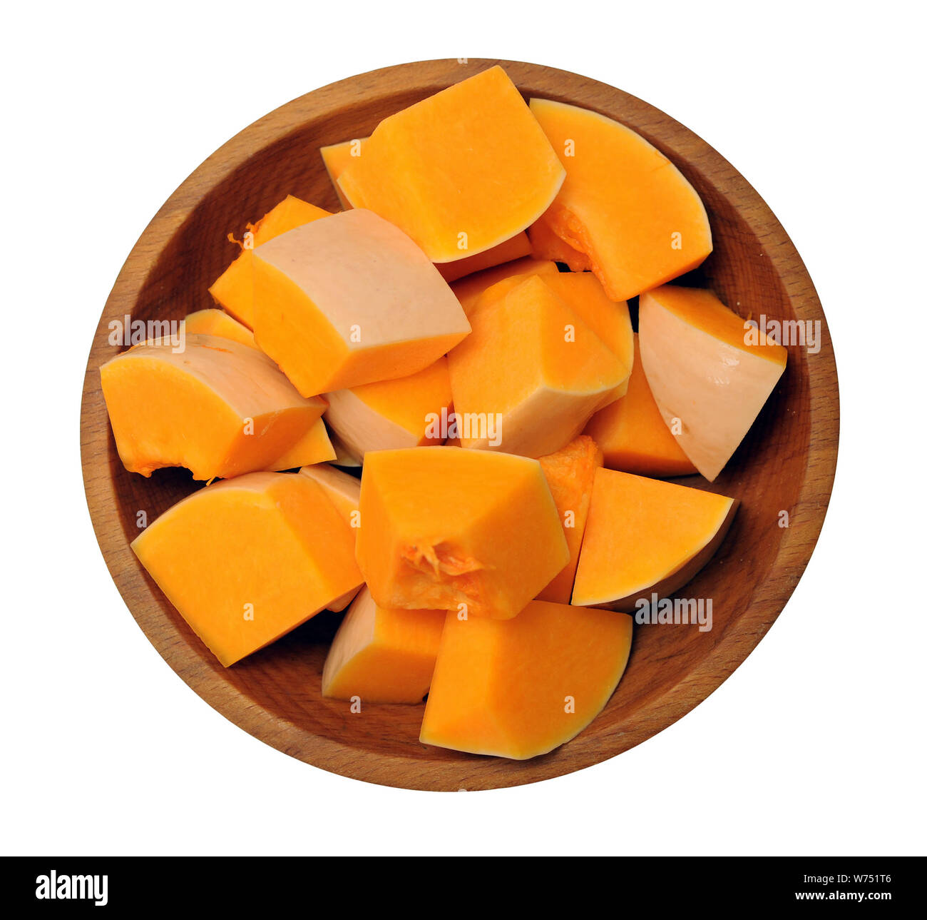 chopped pumpkin in wooden bowl isolated on white background Stock Photo ...