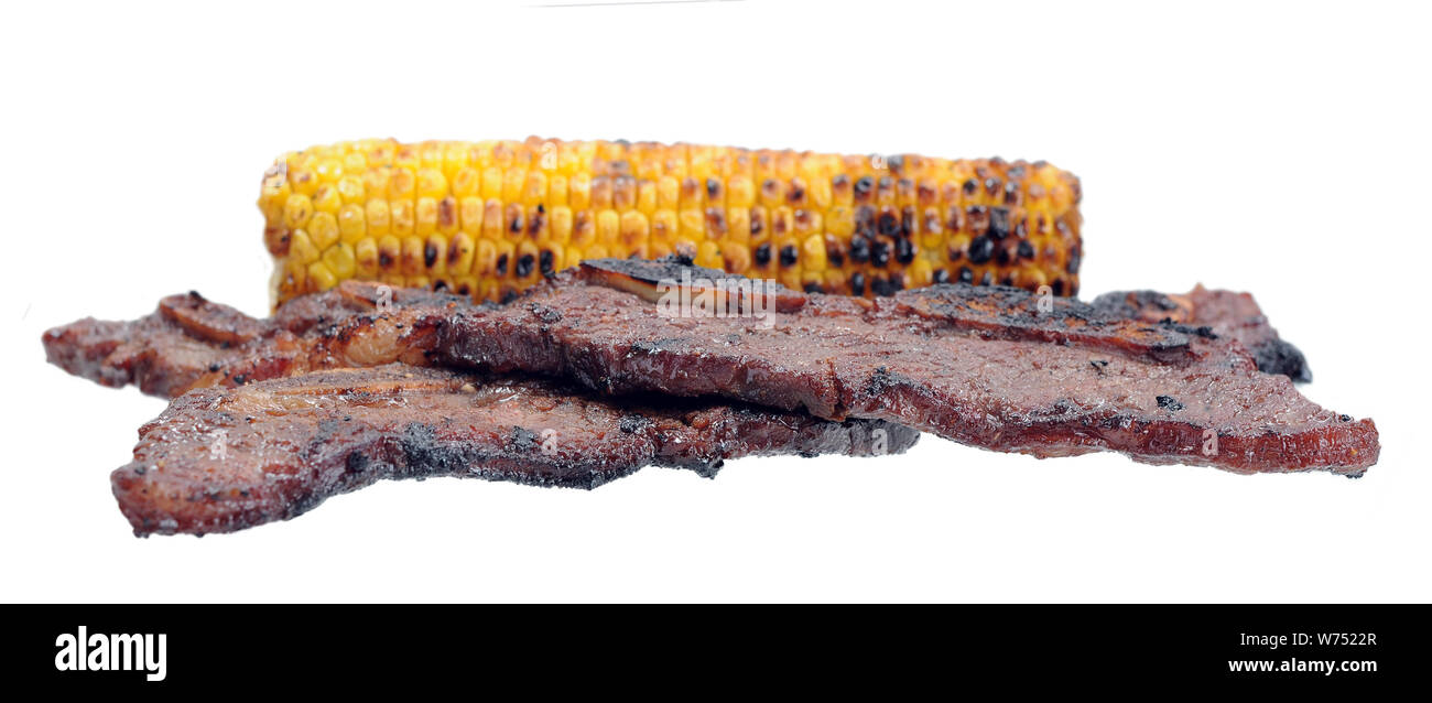 two slice of beef rib with corn isolated on white Stock Photo - Alamy