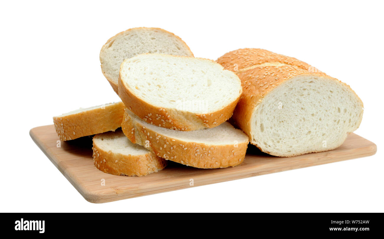 Vienna bread slice on cutting board isolated on white Stock Photo - Alamy