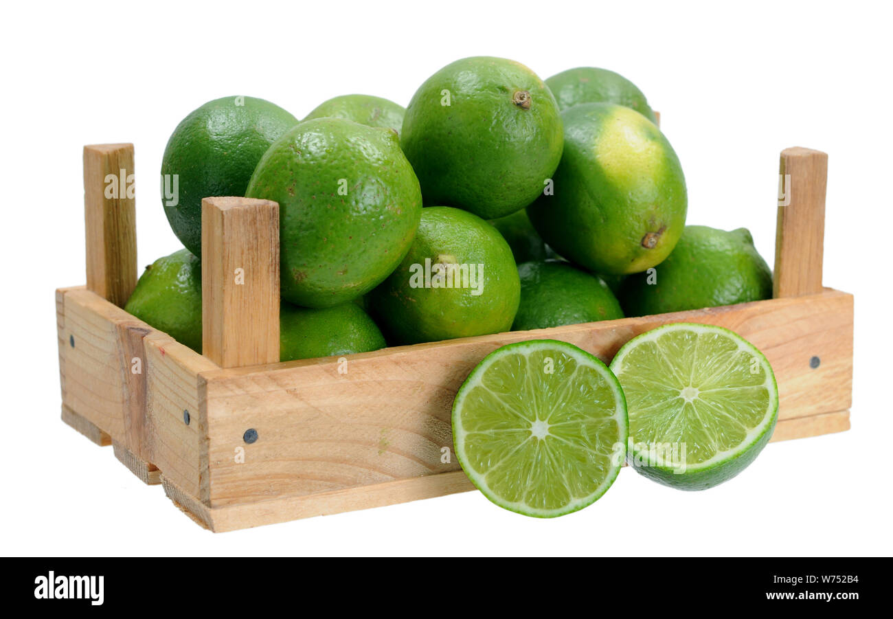 lime in crate isolated on white Stock Photo - Alamy