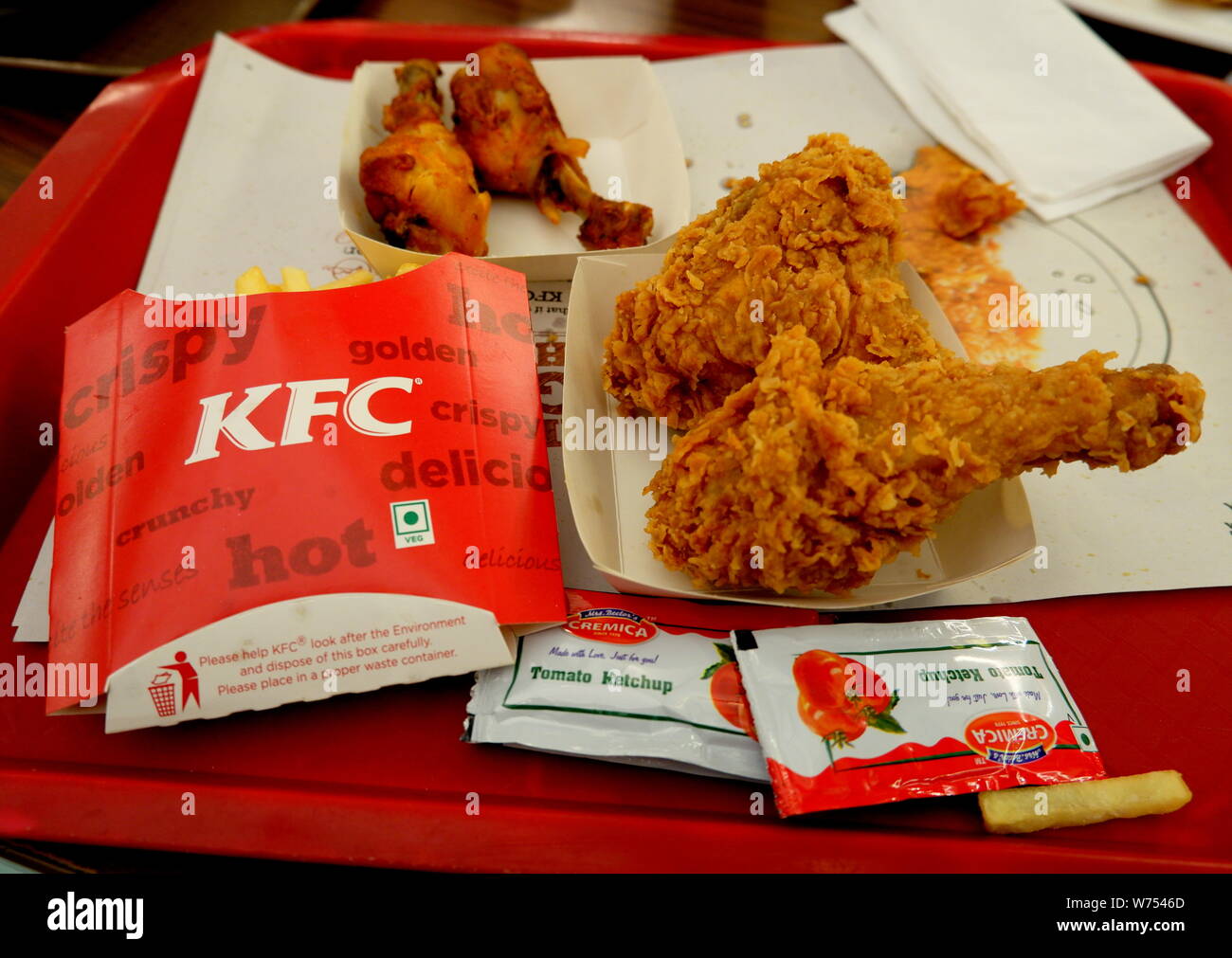 Fresh Crispy chicken item seen on the Tray of KFC the American fast ...
