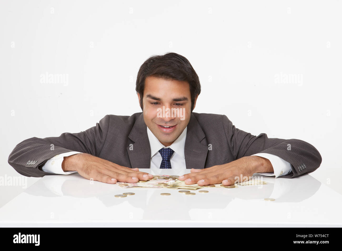 Man grabbing money hi-res stock photography and images - Alamy
