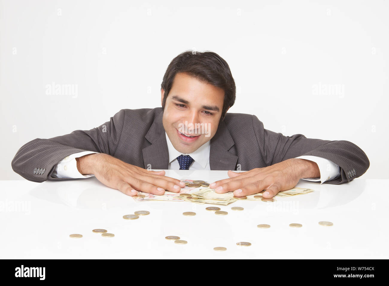 Money grabbing hi-res stock photography and images - Alamy