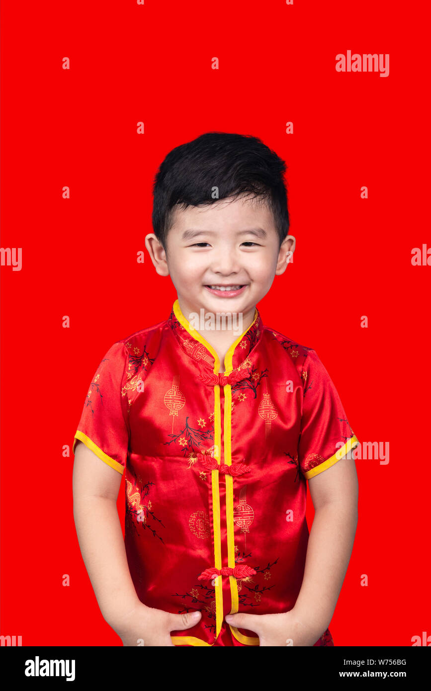 Chinese New Year Concept, Cute Asian boy in red traditional Chinese ...