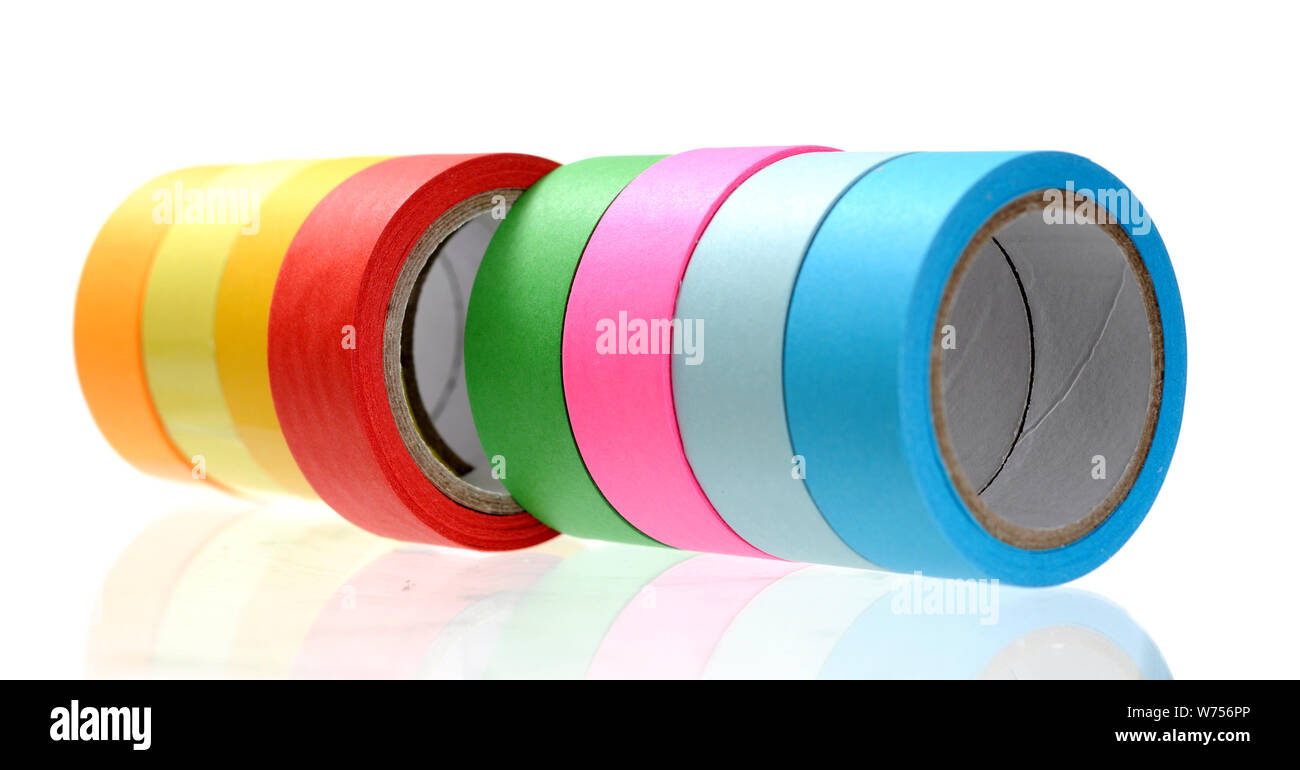 colorful sticky tap rolls (with red roll stand out) against white ...