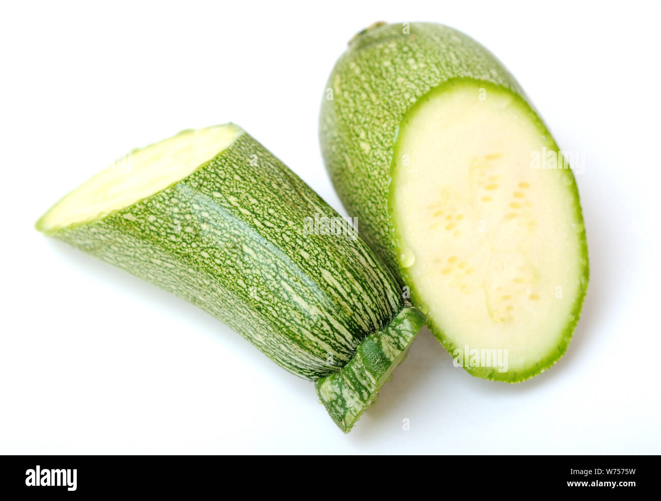 cutting marrow zucchini isolated on white background Stock Photo - Alamy
