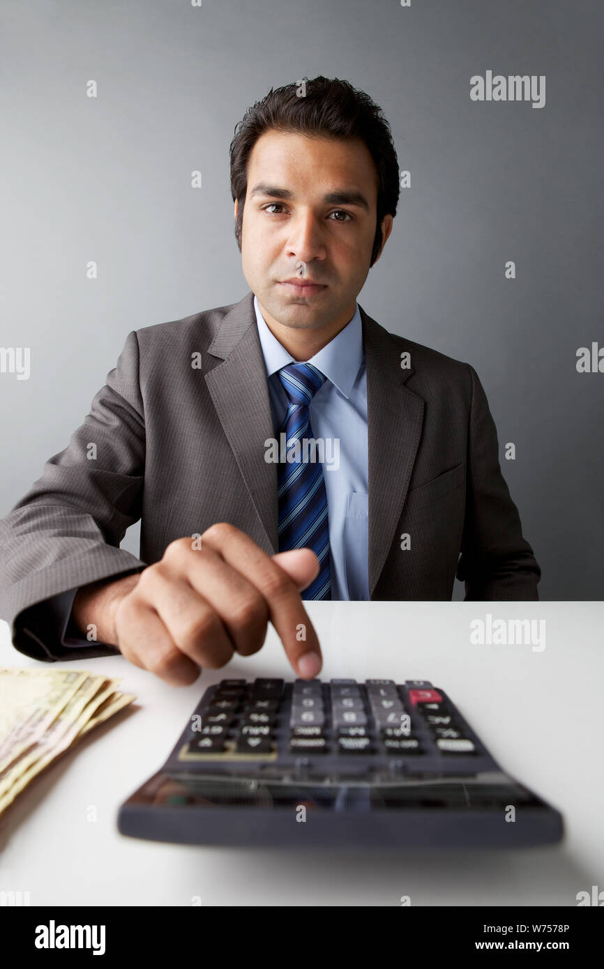 Executive calculator hi-res stock photography and images - Alamy
