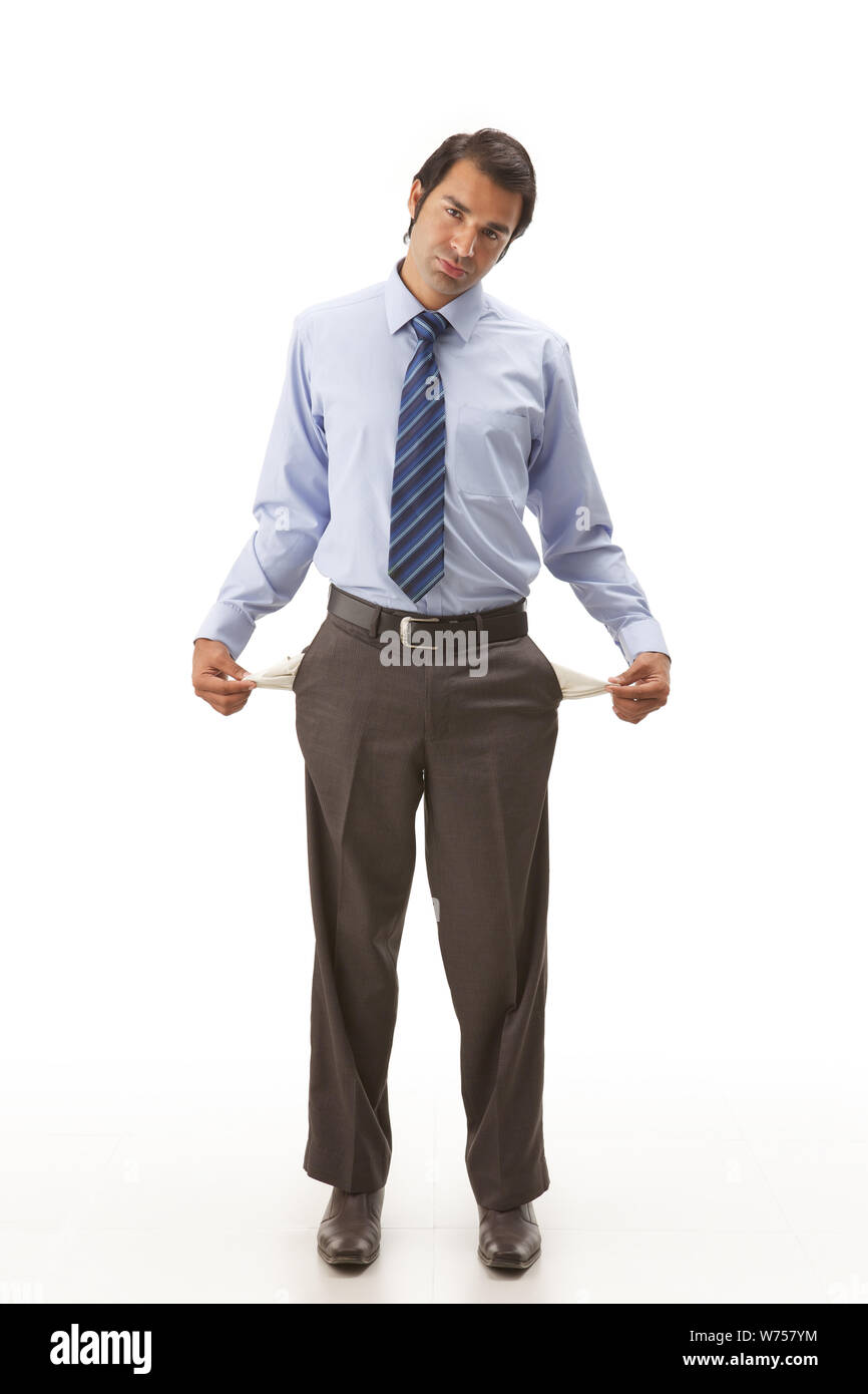 Indian man showing empty pockets hi-res stock photography and images ...