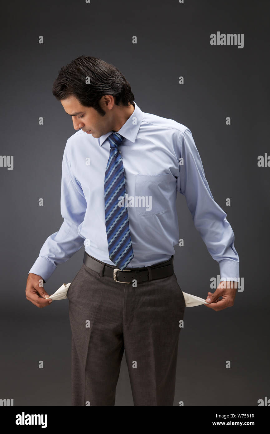 Businessman showing his empty pocket hi-res stock photography and ...