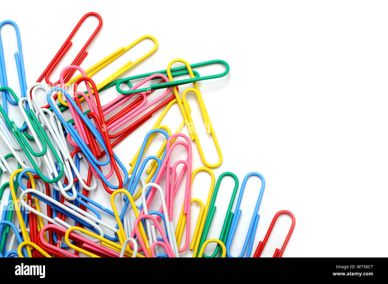 color paper clips on white Stock Photo - Alamy