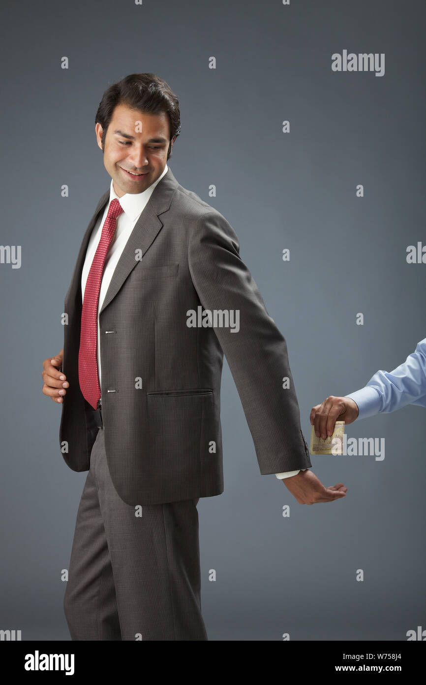Man bribing hi-res stock photography and images - Alamy