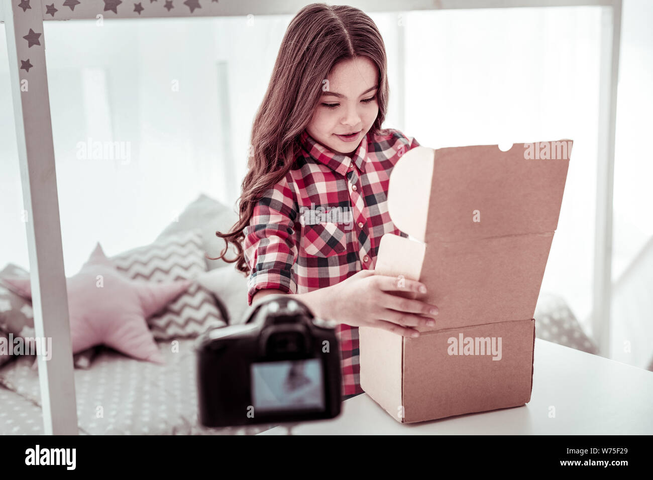 Kid opening package child hi-res stock photography and images - Alamy