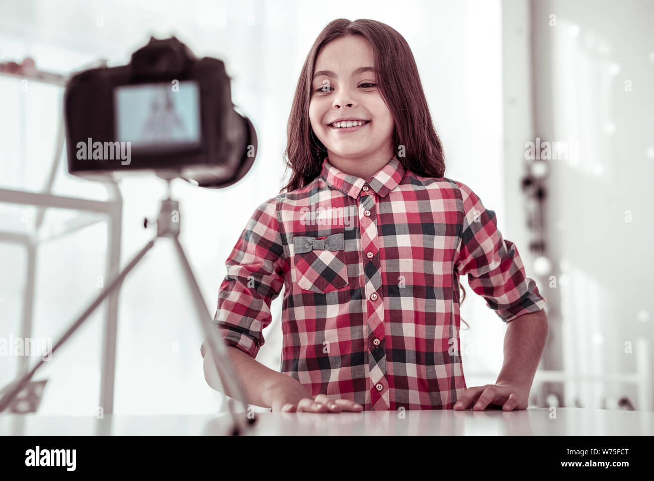 Cheerful happy girl smiling into the camera Stock Photo - Alamy