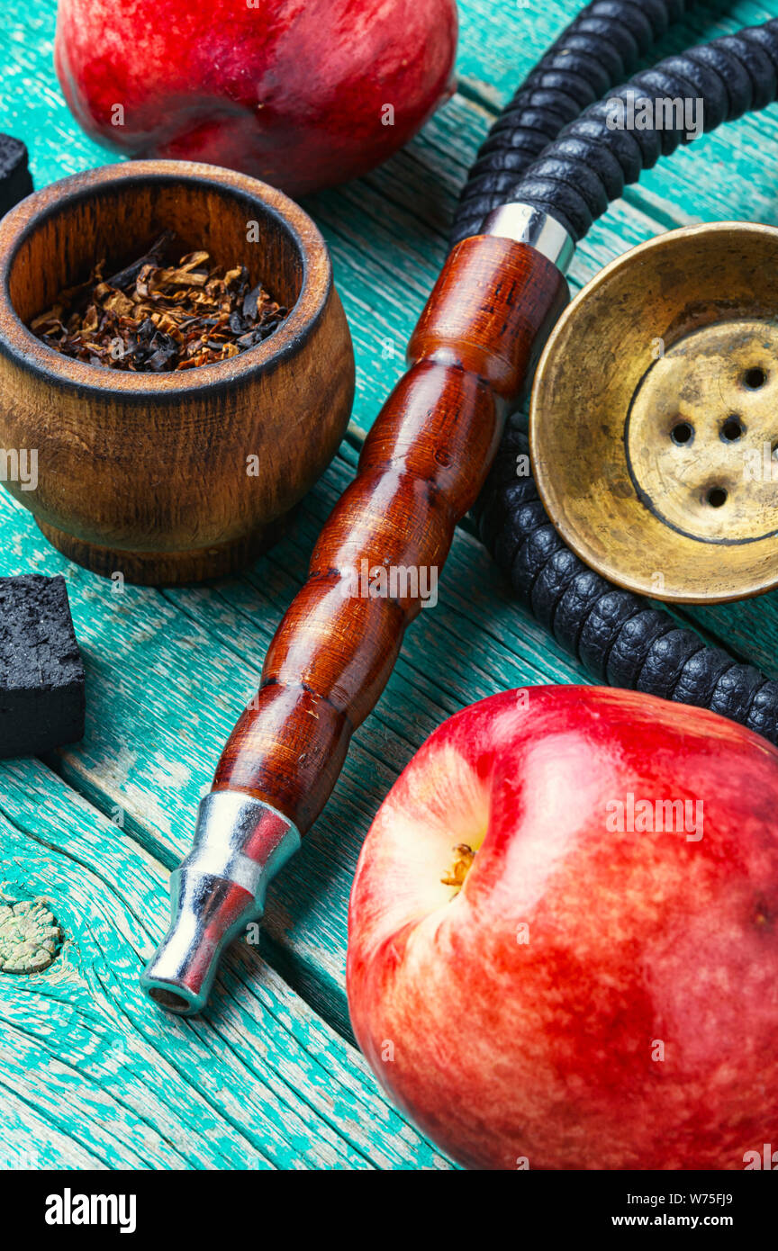 Tobacco shisha with nectarine flavor.Hookah with peach Stock Photo - Alamy