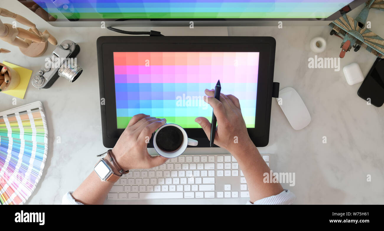 Professional graphic designer working graphic with colour chart Stock ...