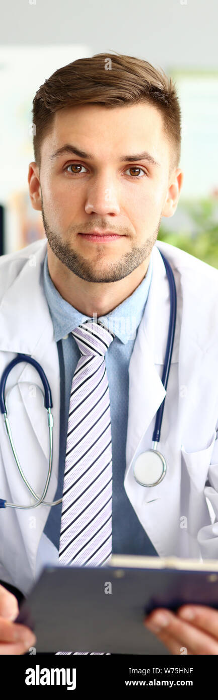 Happy male doctor laughing portrait hi-res stock photography and images ...