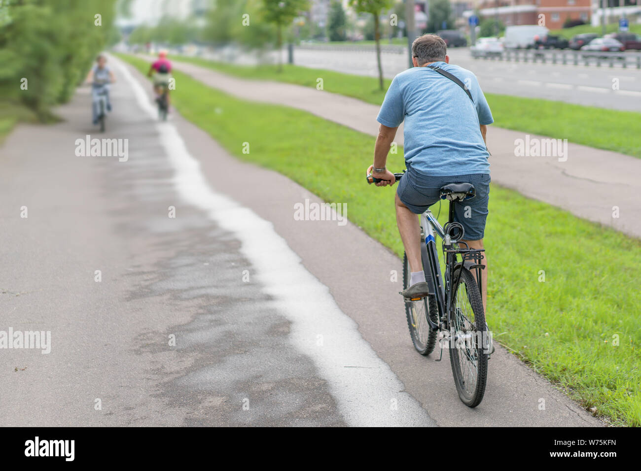 Healthy lifestyle - people riding bicycles in city Stock Photo - Alamy