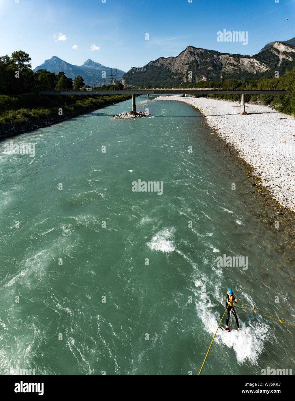 Maienfeld, GR / Switzerland - 4. August 2019: man wakeboard surfing on ...