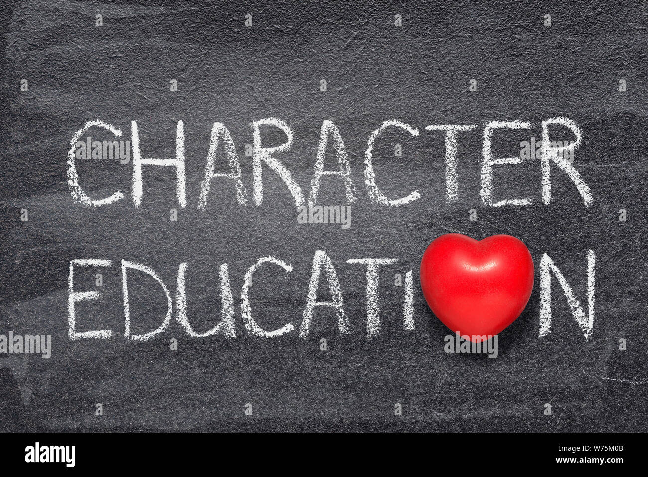character education phrase handwritten on chalkboard with red heart ...