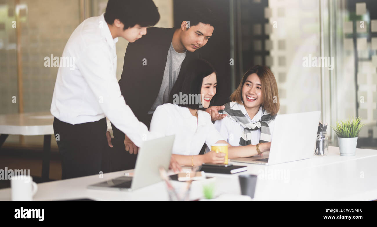 Young hardworking business team exchanging there ideas with positive ...
