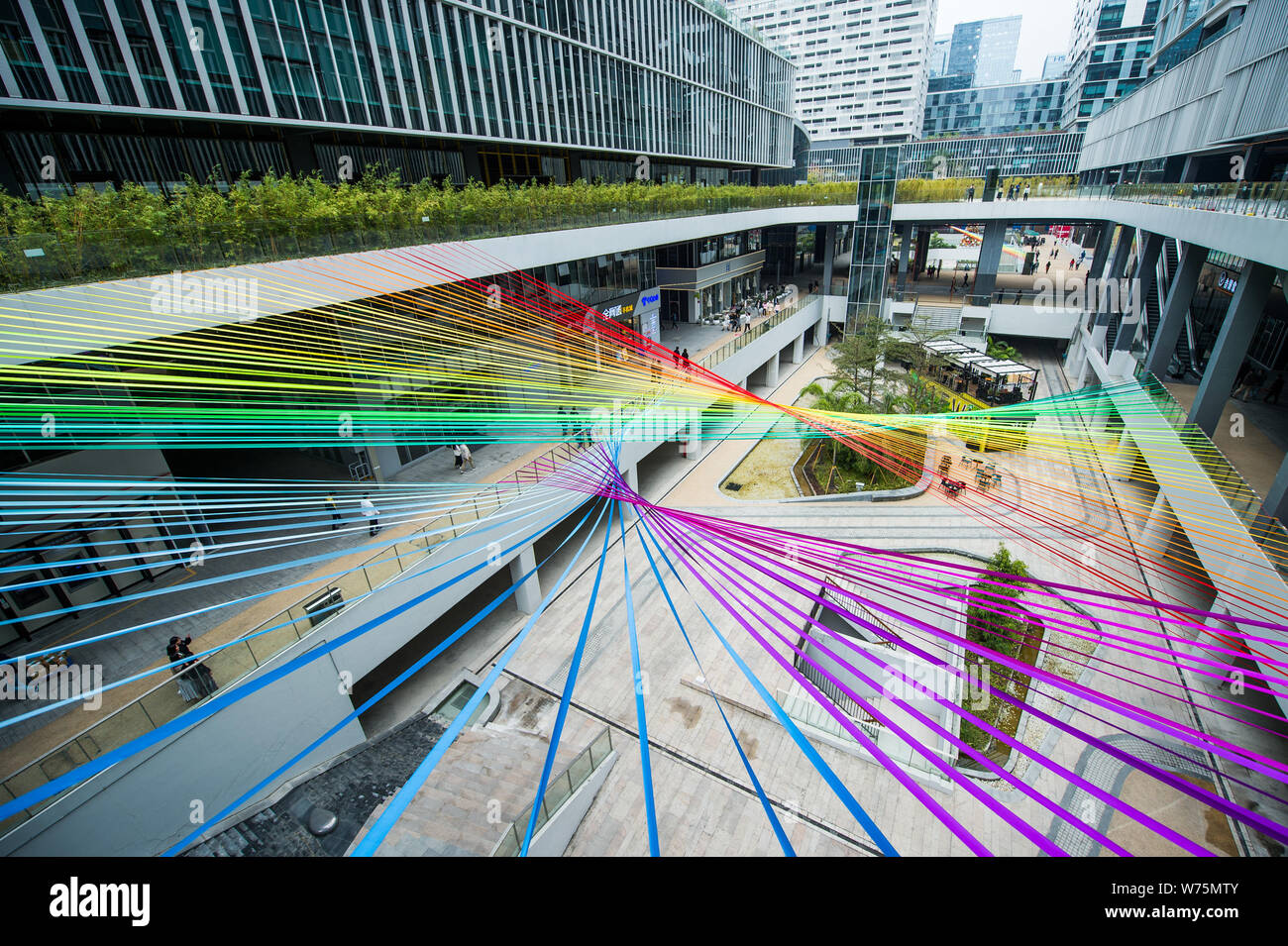Colorful ribbons used to decorate buildings are viewed from different ...